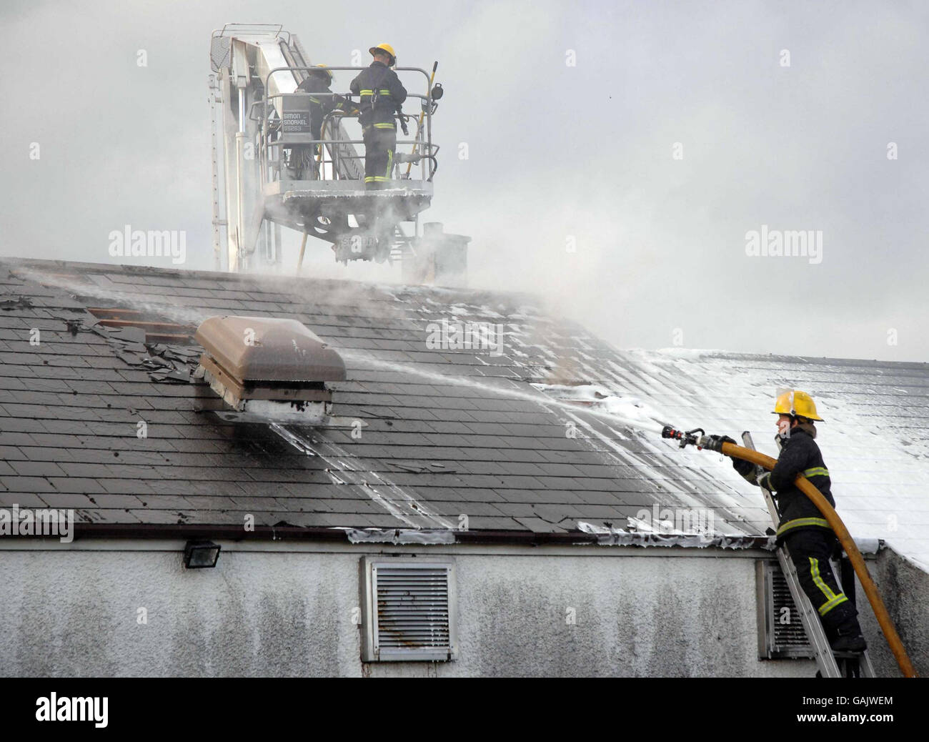 Firefighters at the Tidy Doffer pub in Ravernet on the outskirts of ...