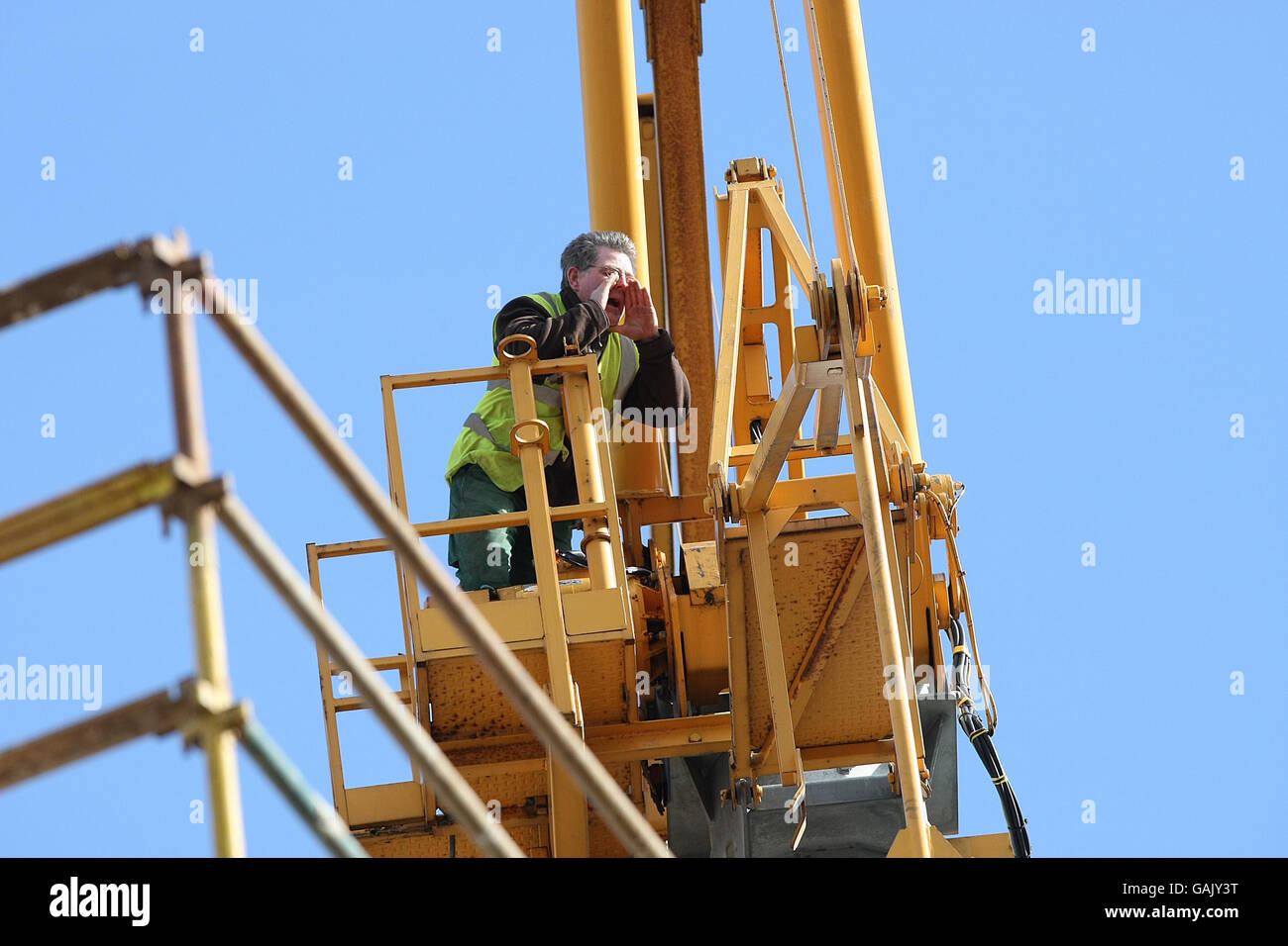 Paul Hansard shouts from the top of the 100 ft crane that he had ...