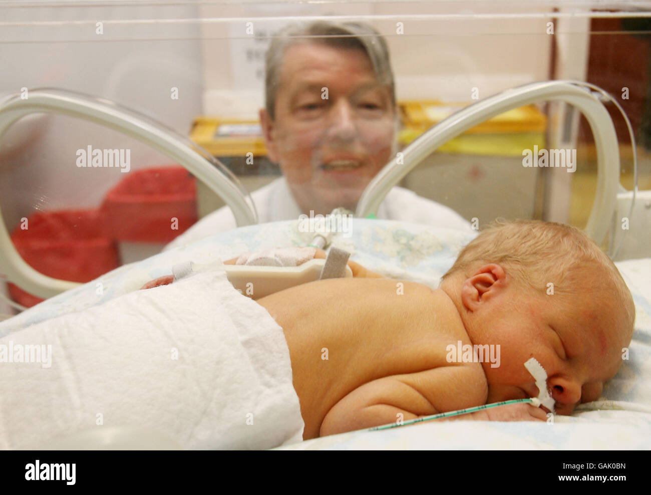 Health Secretary Alan Johnson takes a look at baby Hannah Ridley born 6 ...
