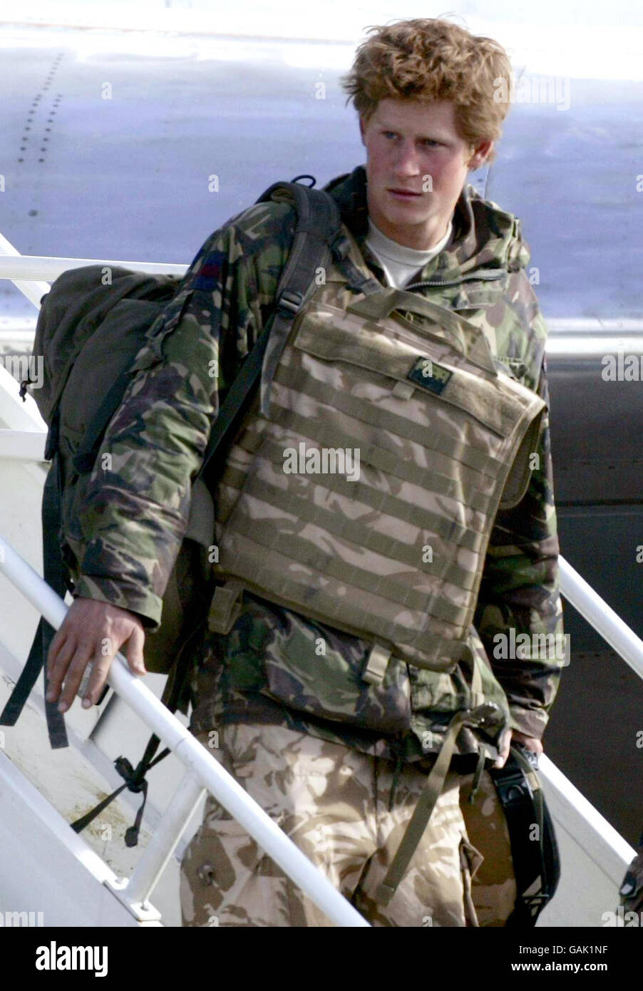 Prince Harry stepping of a plane at RAF Brize Norton in Oxfordshire on ...
