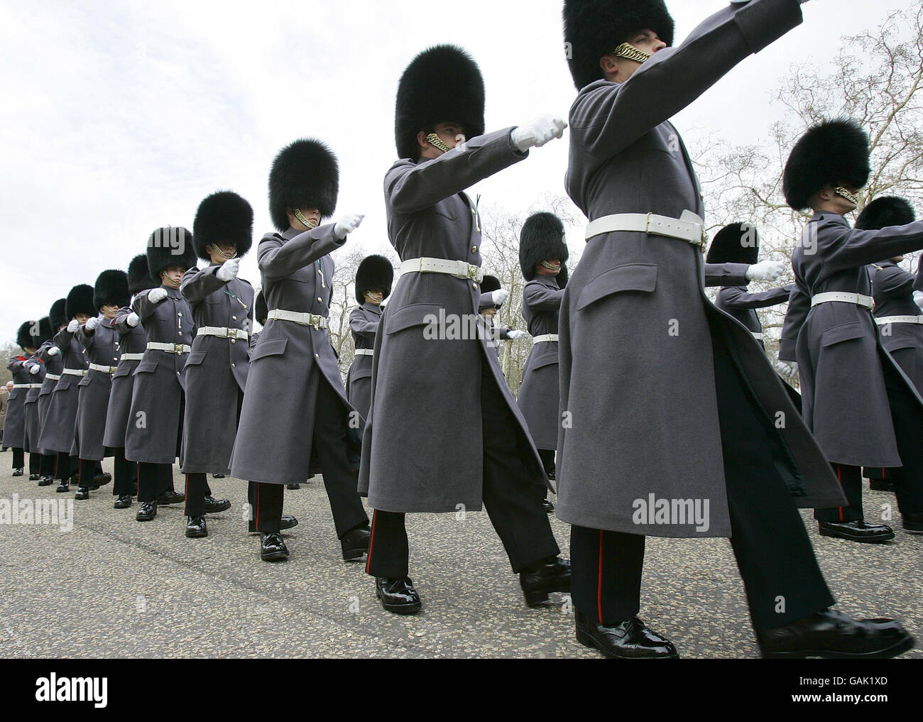 Soldiers from the First Battalion Welsh Guards salute as they march ...