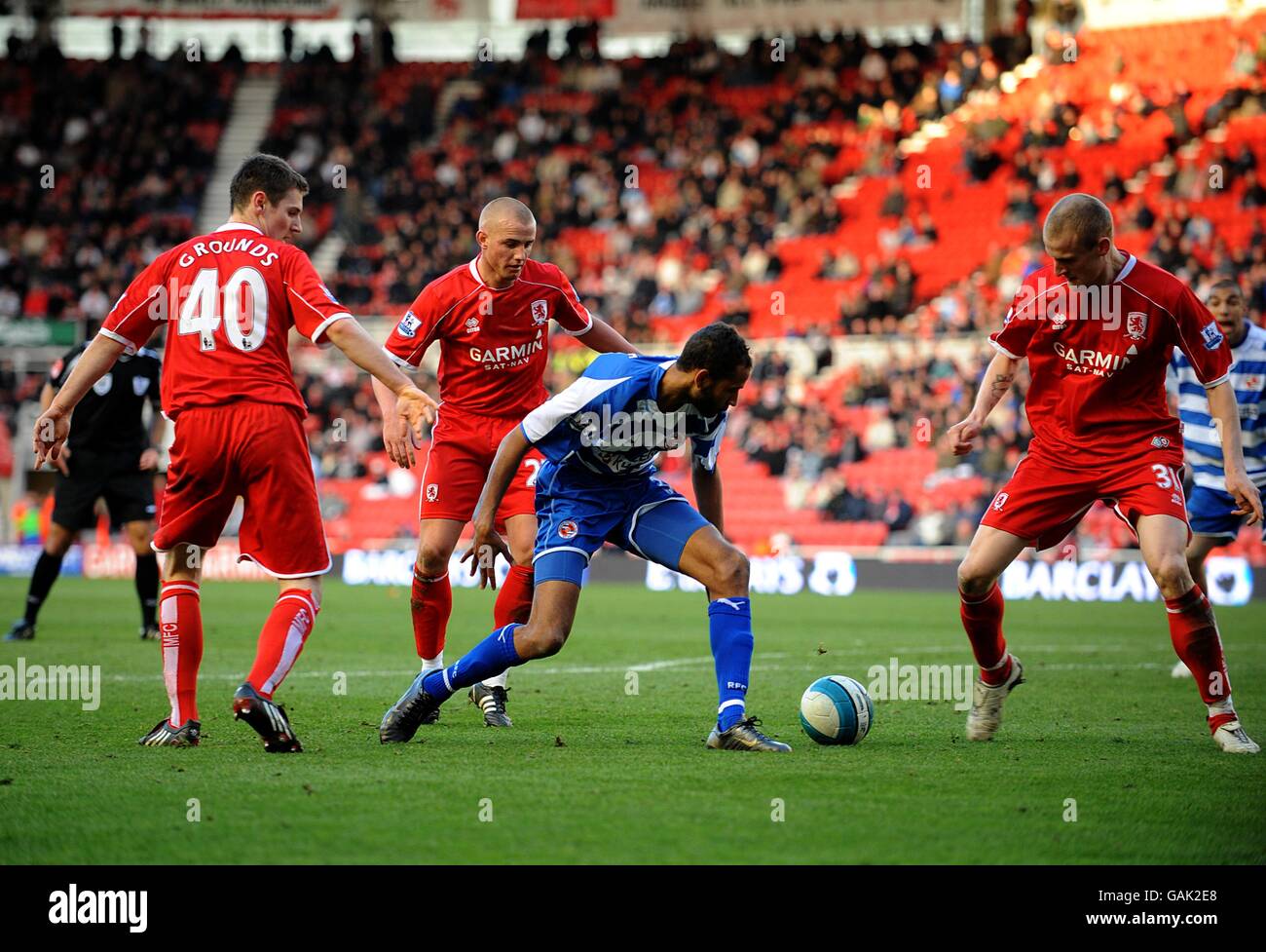 Reading's Jimmy Kebe is surrounded by Middlesbrough's defence Stock ...