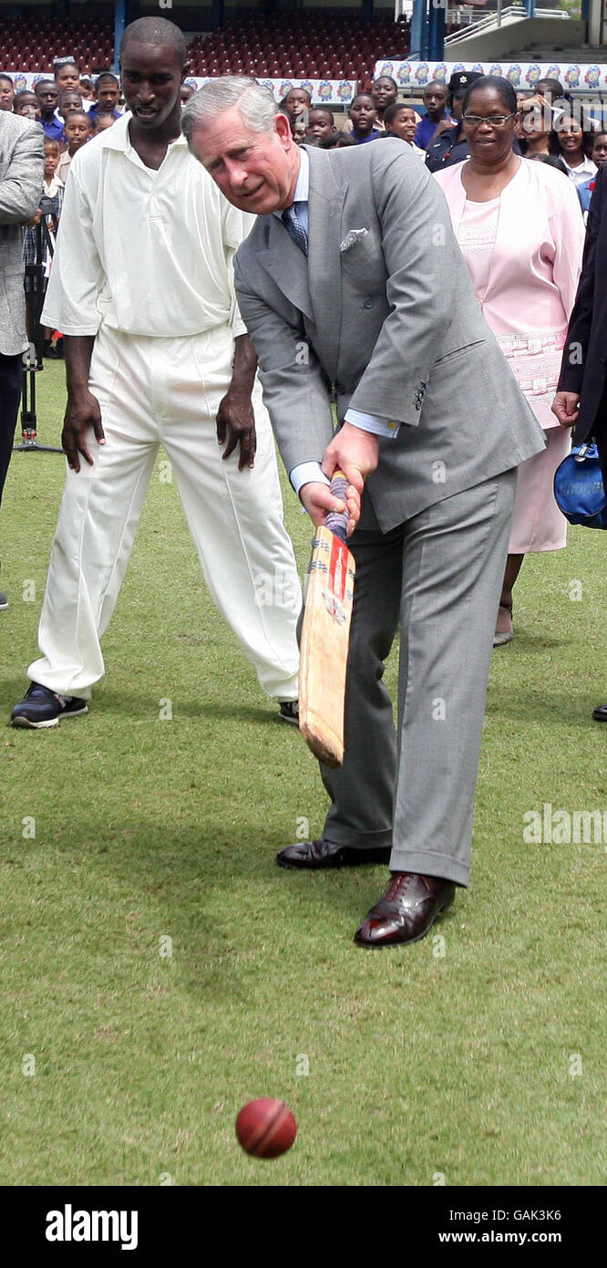 The Prince of Wales tries his hand with a cricket bat on a visit to the ...