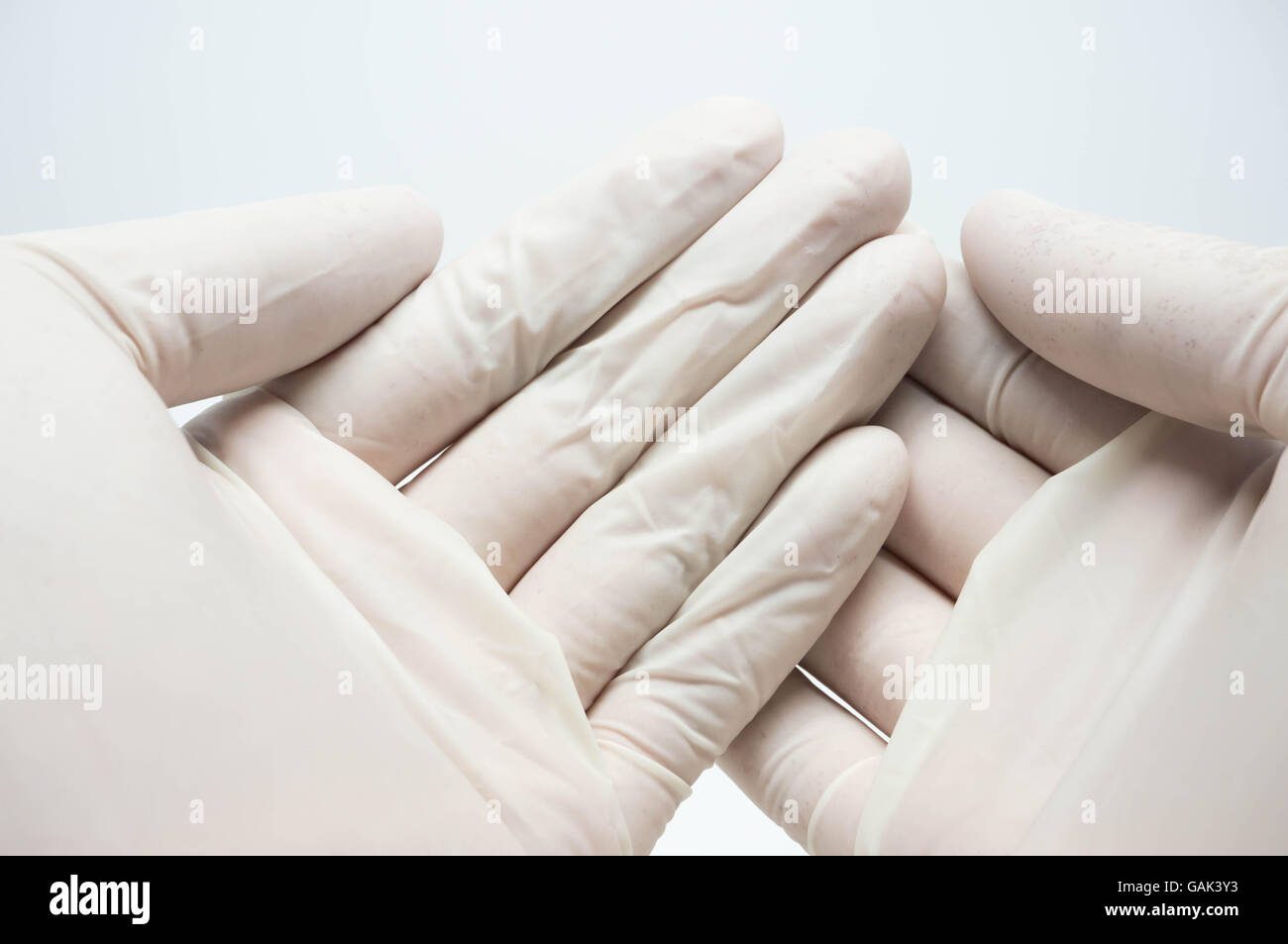 White gloves hi-res stock photography and images - Alamy