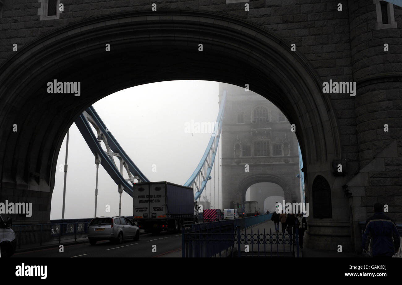 London fog. Scenes on and around London's Tower Bridge, in early ...