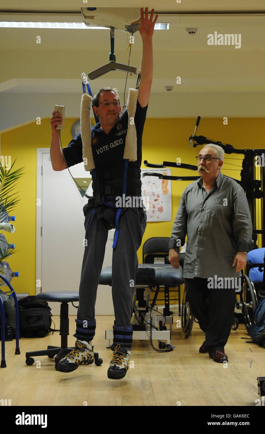 Paralysed man back on feet Stock Photo - Alamy
