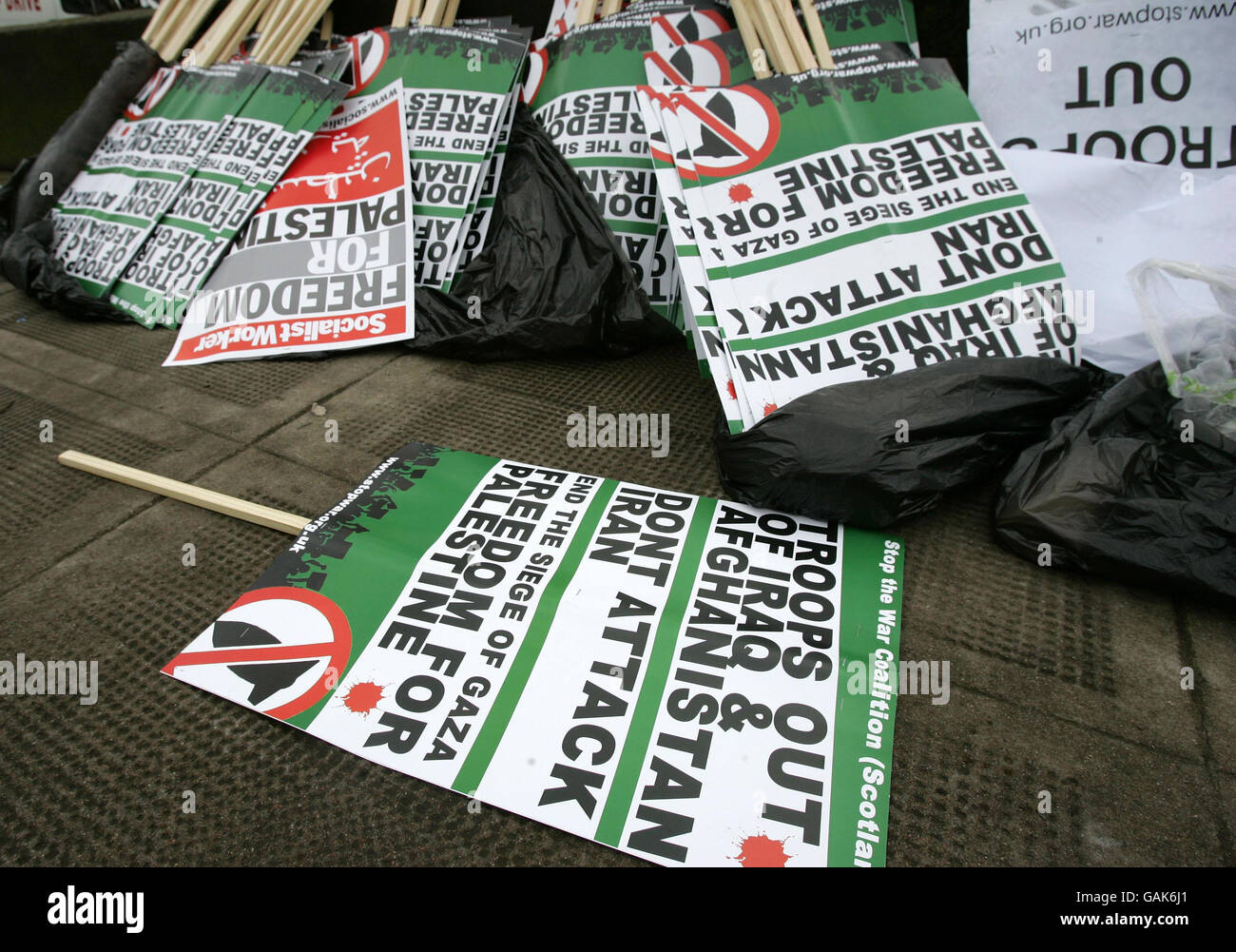 Anti war placards ready to be handed out for use in a anti-war protest ...