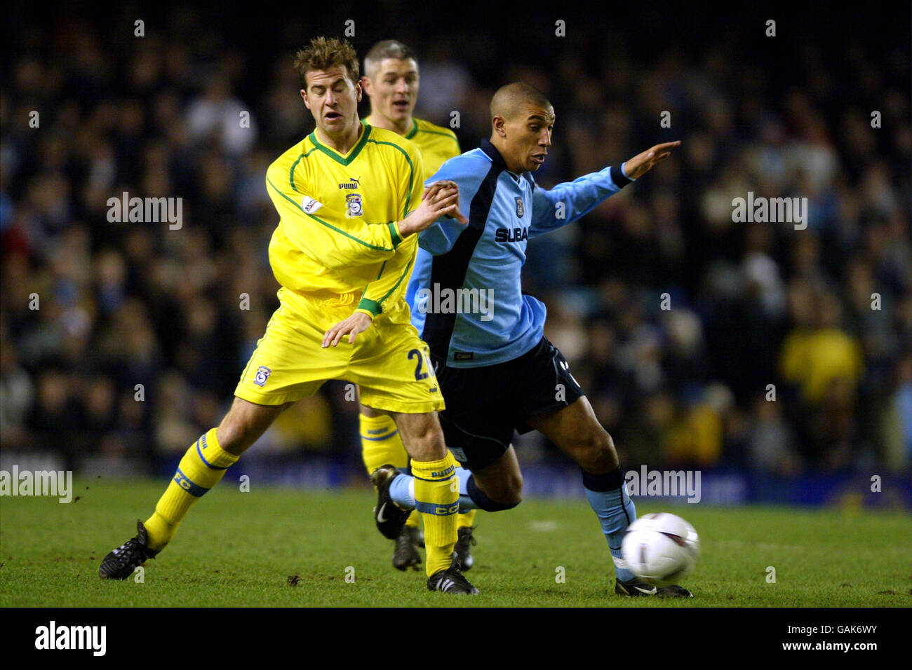 Coventry City's Jay Bothroyd and Cardiff City's Gary Croft battle for ...