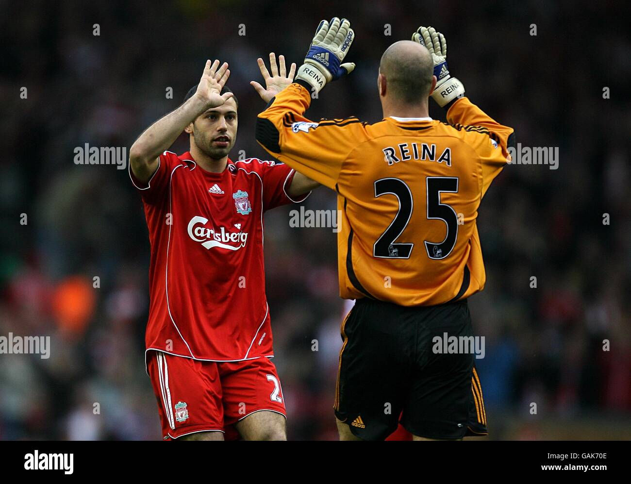 Liverpool's Javier Mascherano (left) and goalkeeper Jose Reina ...