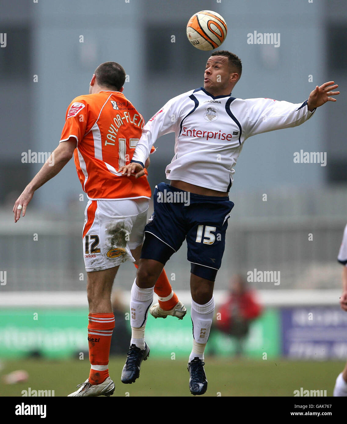 Preston's Simon Whaley (l) and Blackpool's Gary Taylor-Fletcher battle ...