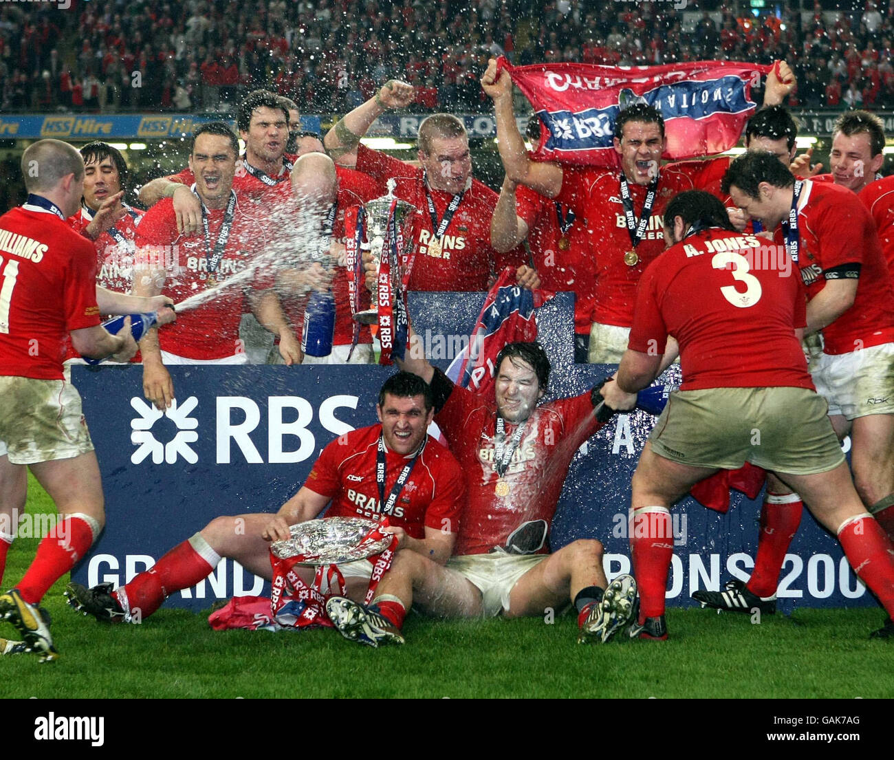 Champagne celebration full length trophy hi-res stock photography and ...