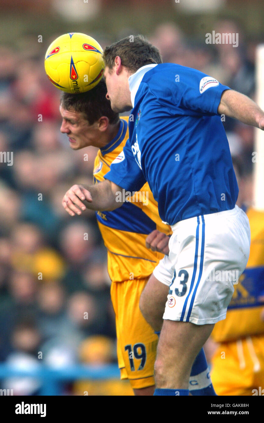 Chesterfield's David Reeves (r) and Mansfield Town's Rhys Day (l ...