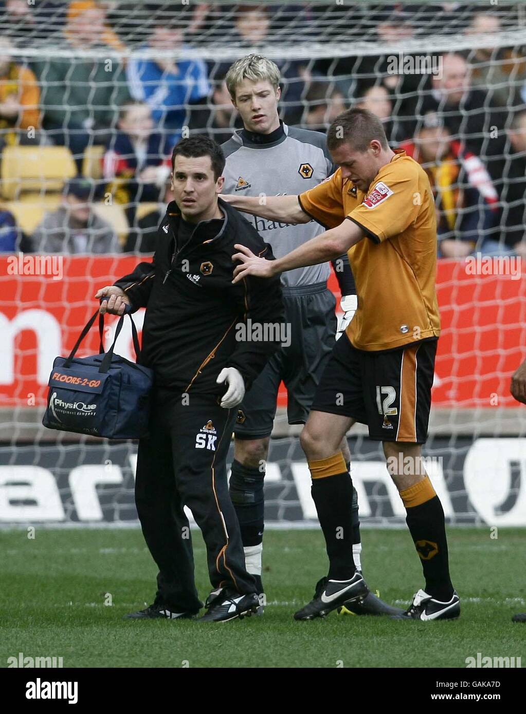 Wolverhampton's Rob Edwards is injured during the Coca-Cola ...