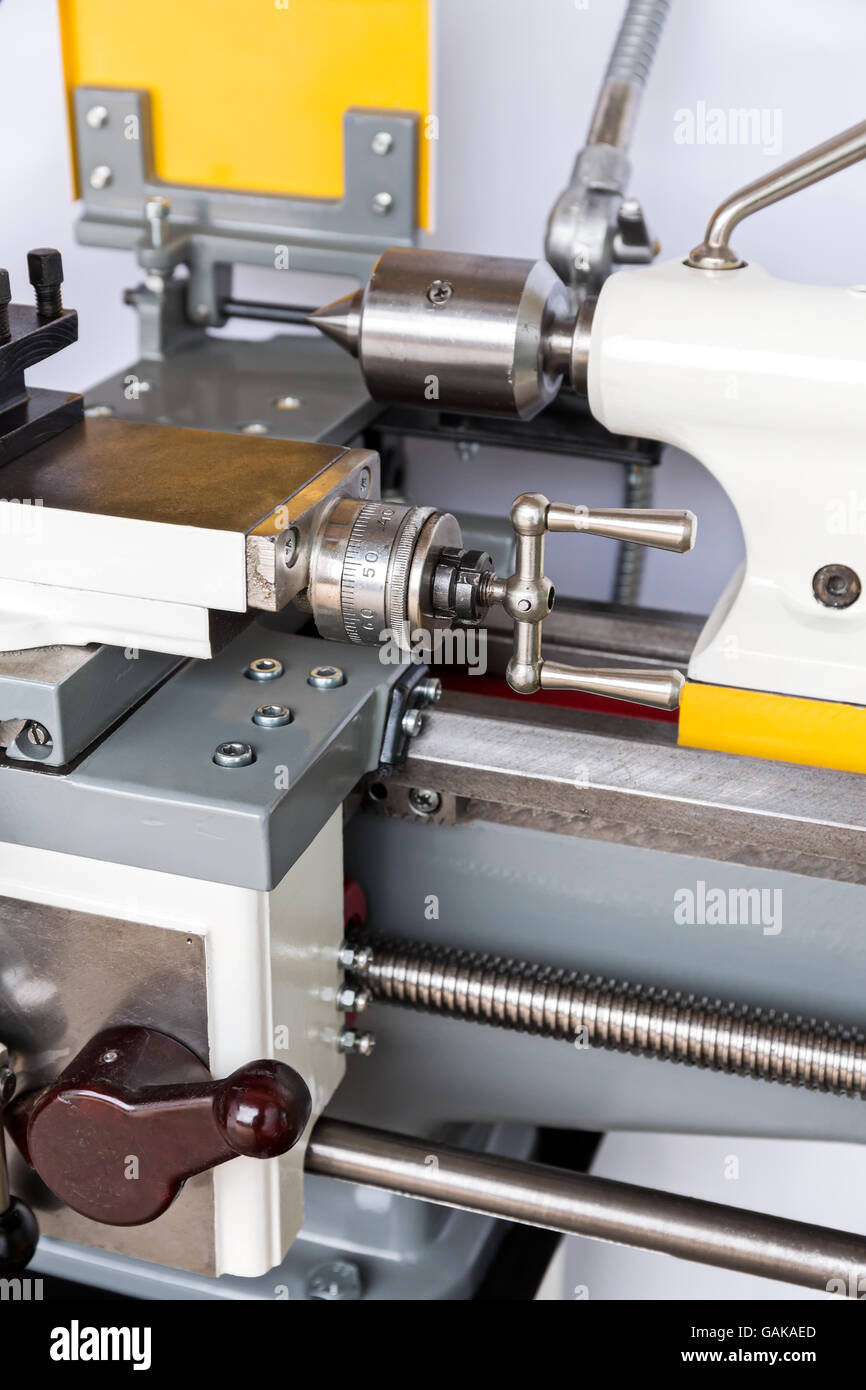 Metal lathe machinery tool equipment in workshop Stock Photo - Alamy