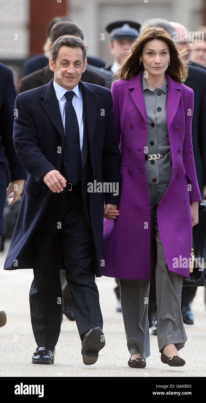 French President Nicolas Sarkozy and his wife Carla Bruni arrive at ...