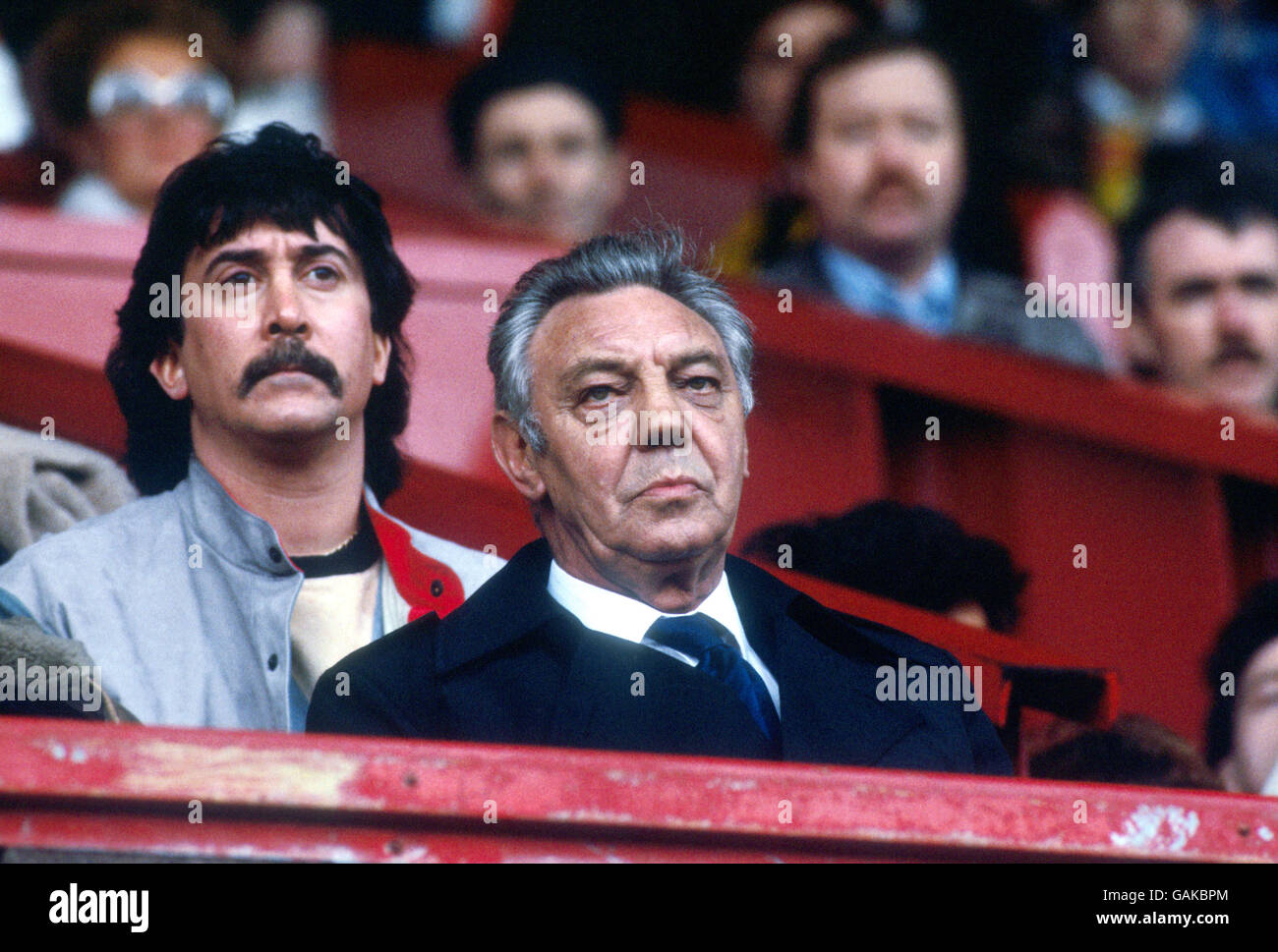 Liverpool manager Joe Fagan (r) watches the match from the directors ...