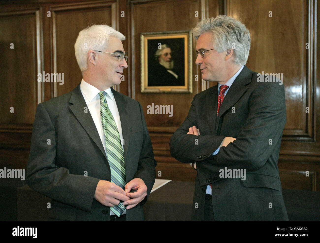 Britain's Treasury chief Alistair Darling (left) talks with Lord Adair ...