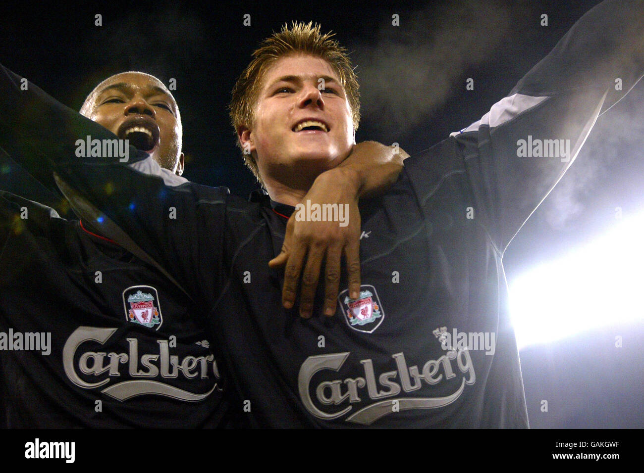 Liverpool's Neil Mellor celebrates scoring the opening goal with team ...