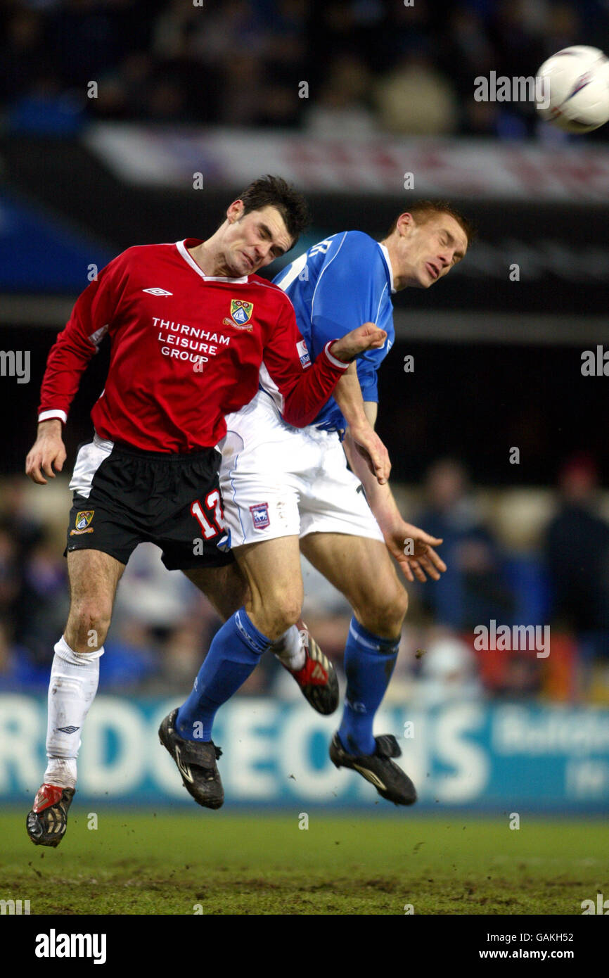 Ipswich Town's Richard Naylor (r) and Morcambe's Neil Uberschar (l ...