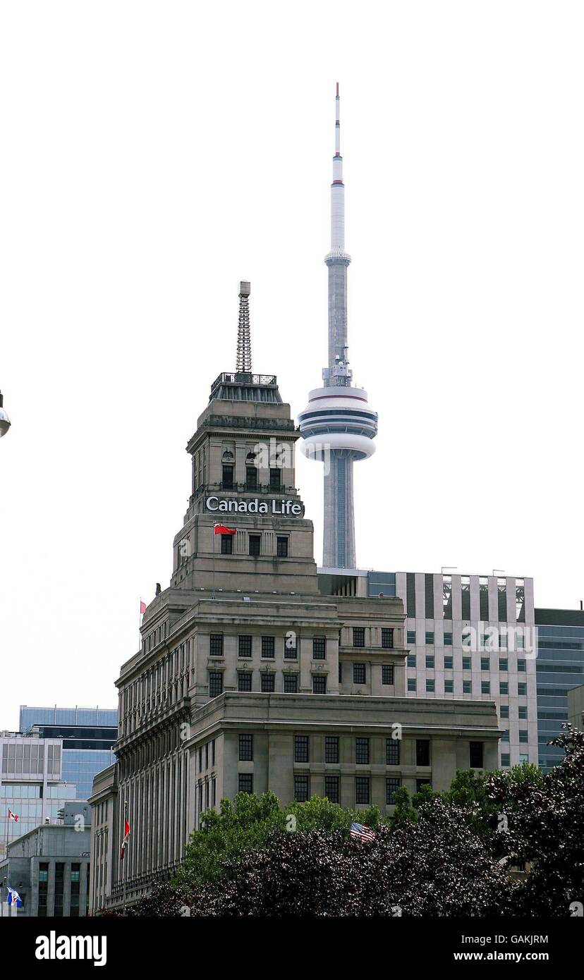 A Canada Life building with the CN Tower behind it in Toronto, Canada ...