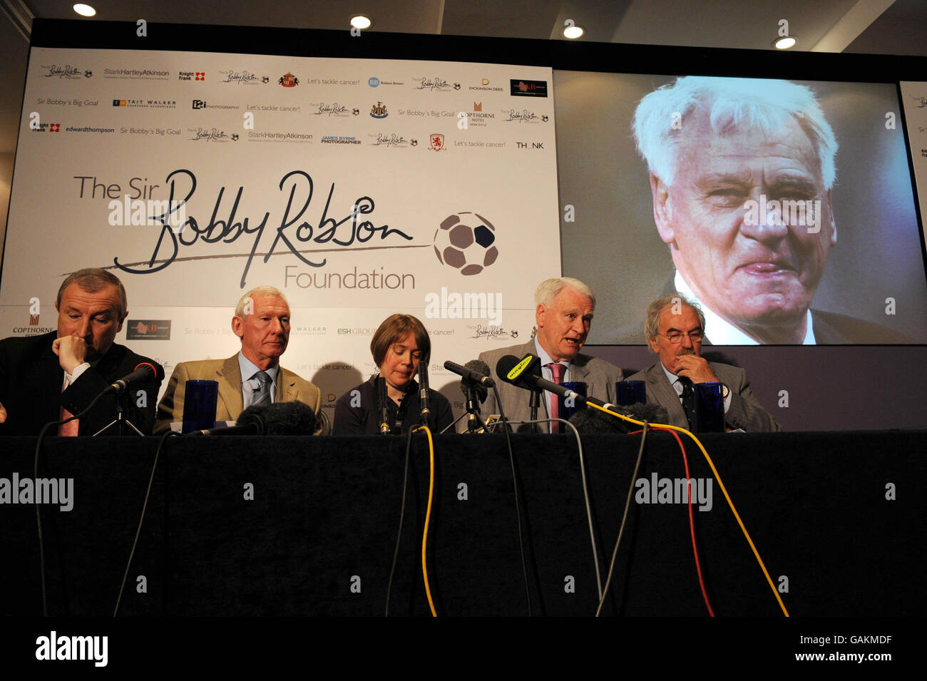 Sir Bobby Robson (second right) who is fighting cancer himself, today ...