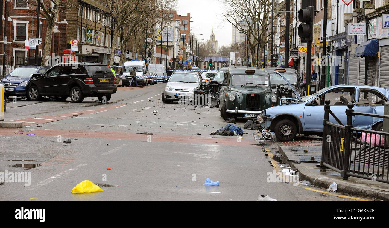 The wreckage of a Vauxhall Corsa, right, remains at the scene in ...