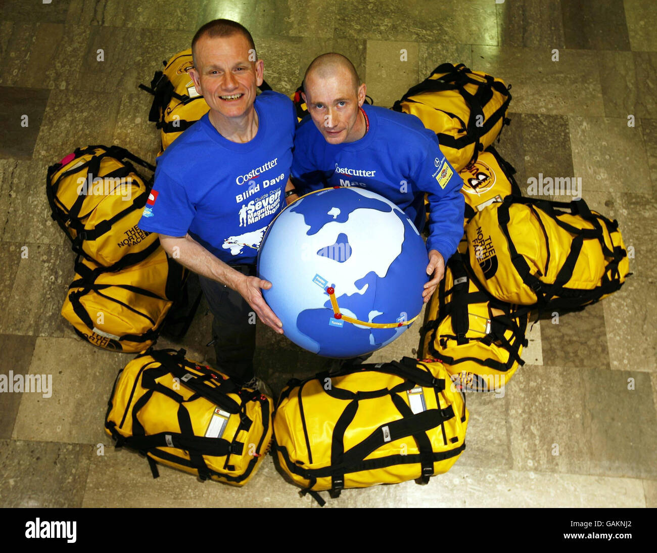 Blind runner Dave Heeley (left) and guide runner Malcolm Carr (right ...