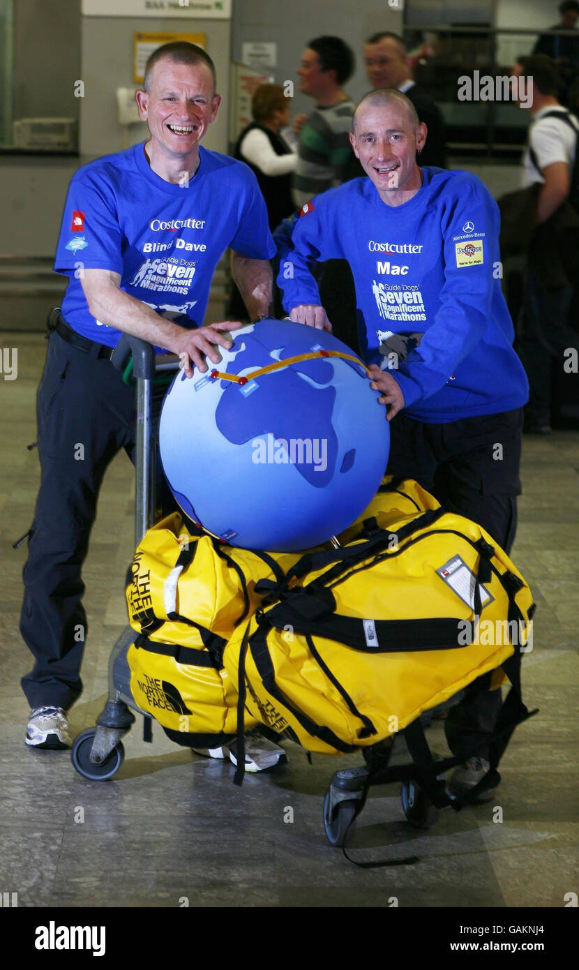 Blind runner Dave Heeley (left) and guide runner Malcolm Carr (right ...