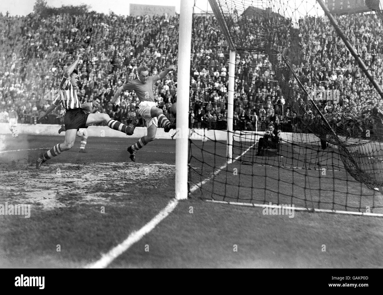 (L-R) Sheffield Wednesday's Don McEvoy stretches, but is unable to ...