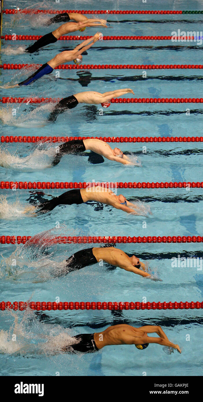 Competitors dive in swimming pool hi-res stock photography and images ...