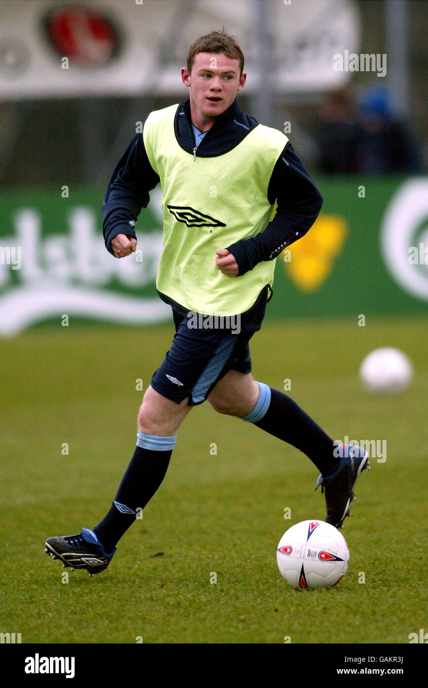 England's Wayne Rooney gets in some dribbling practice during a ...