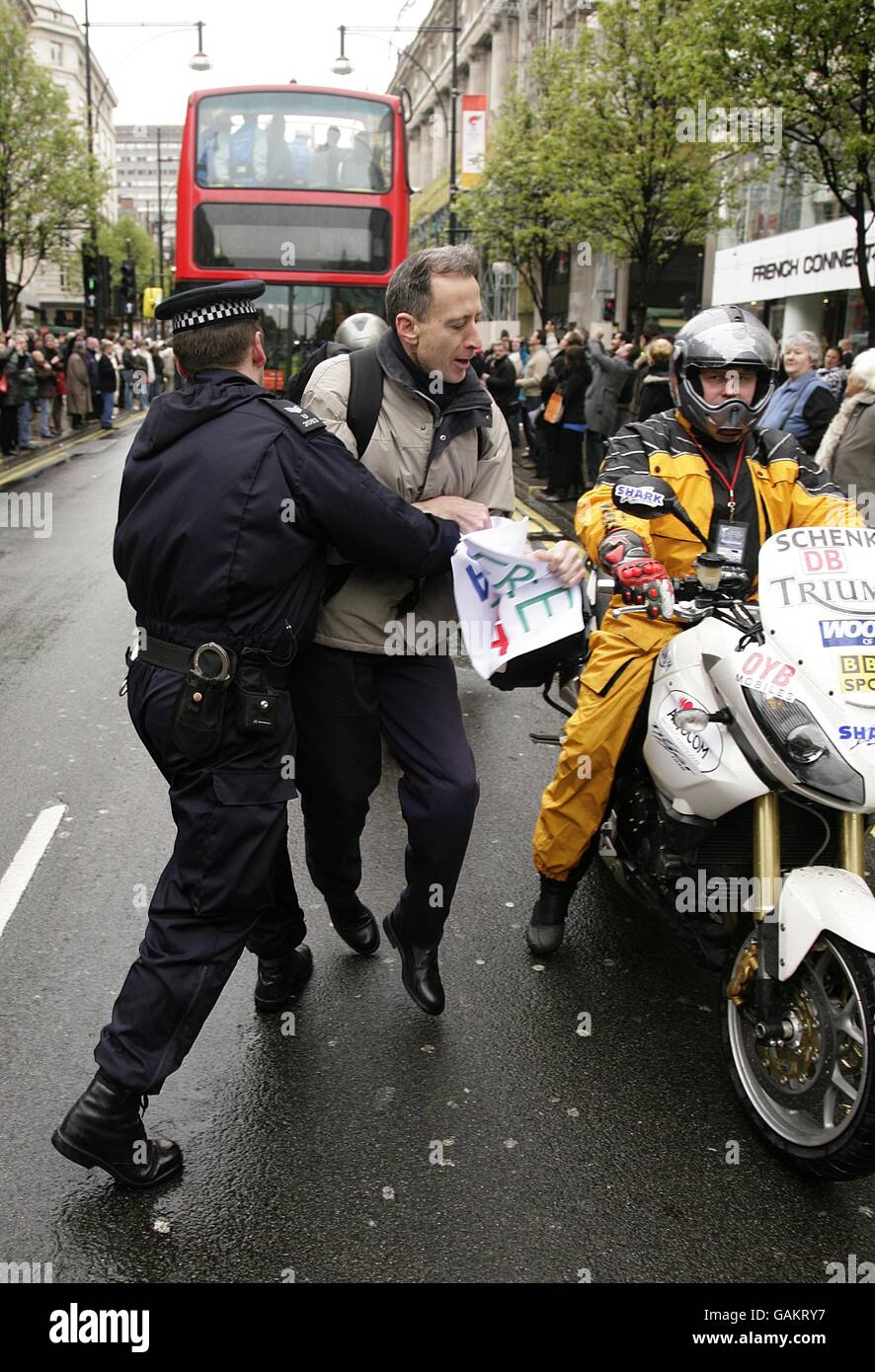 British activist Peter Tatchell demonstrates as the torch leaves Marble ...