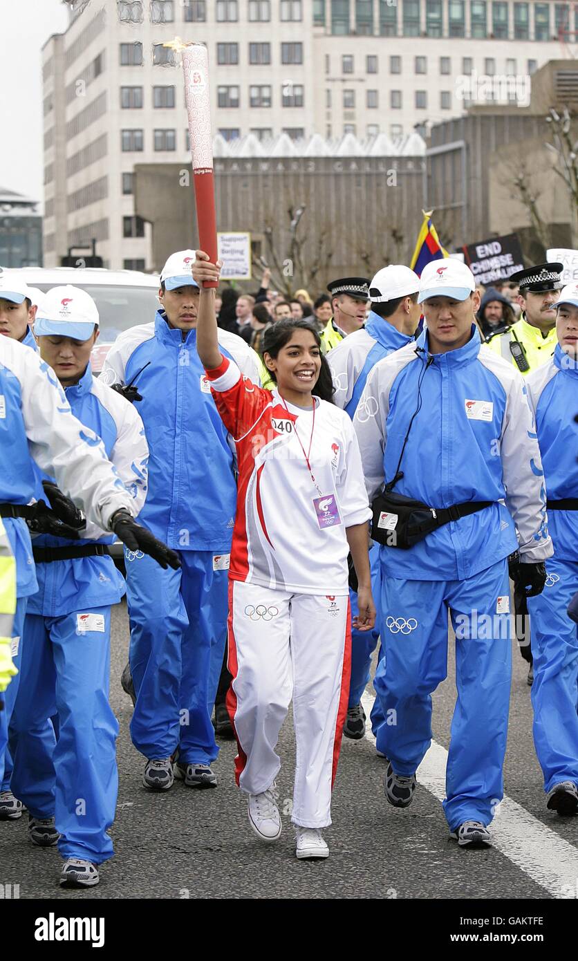 Beijing Olympics Torch Relay - London. Amara Karan carries the torch at ...