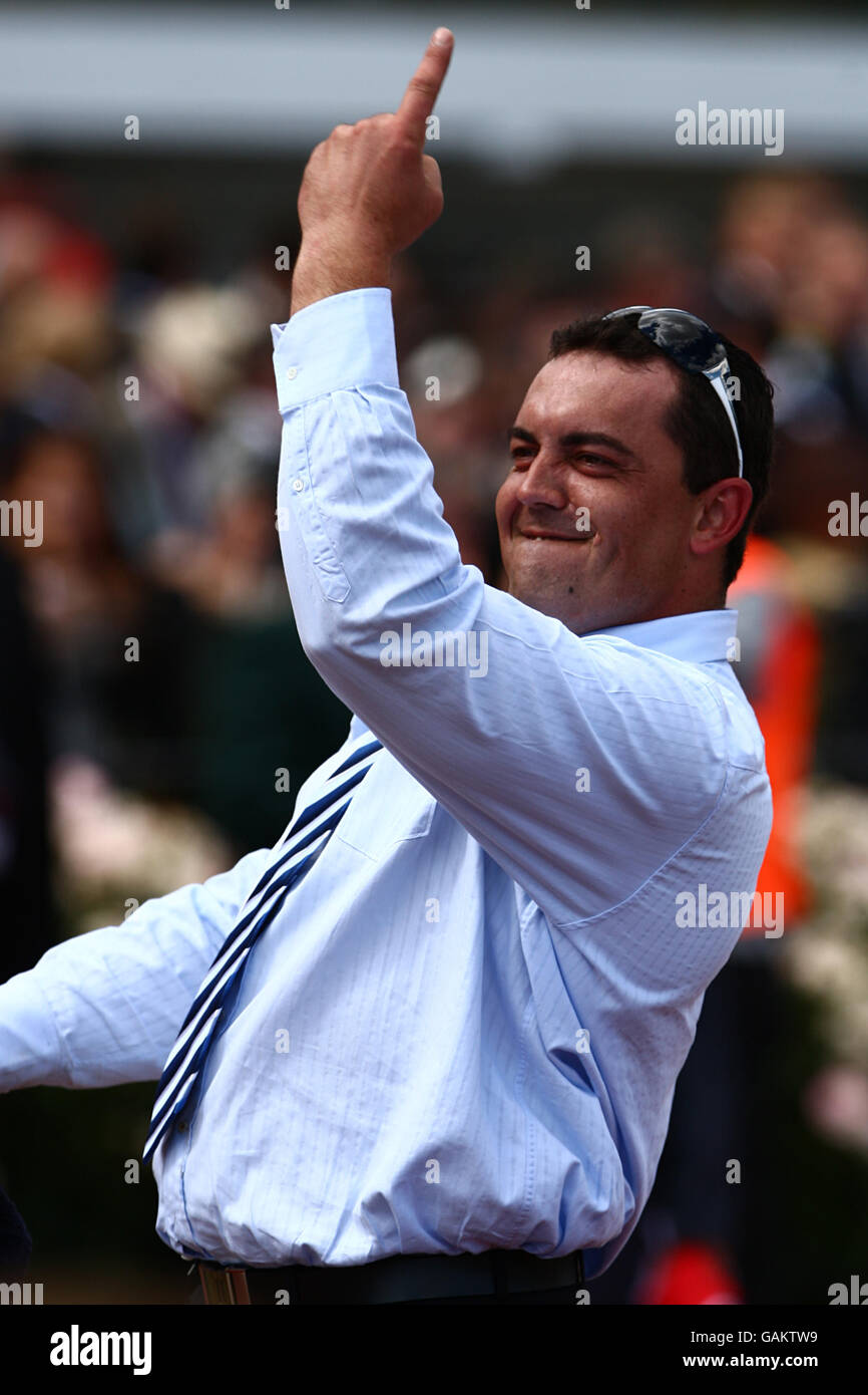 Mark Dosen, stable manager of Efficient celebrates after his horse ...