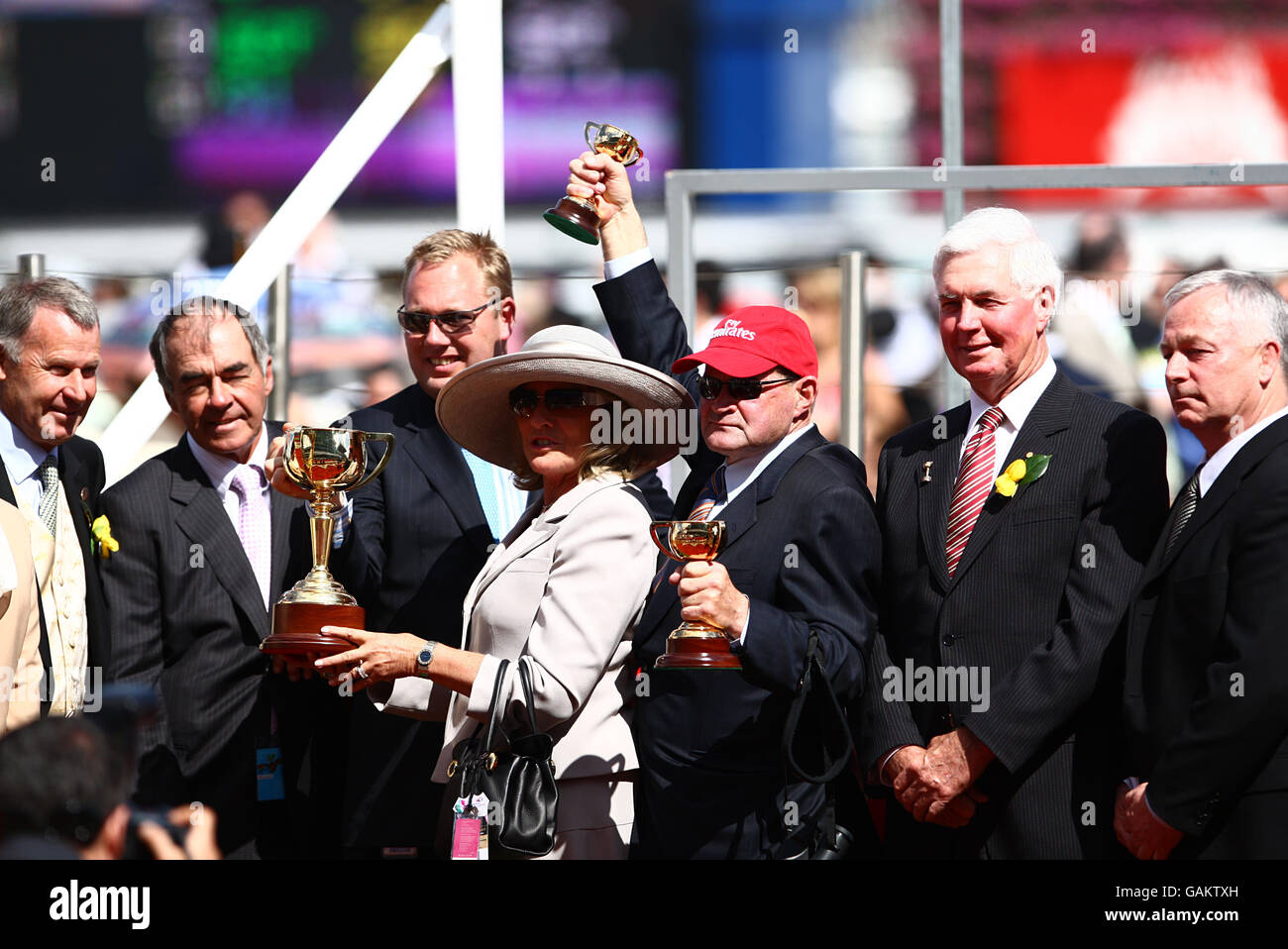 Trainer Graeme Rogerson (third right) and owners Nick Williams (third ...