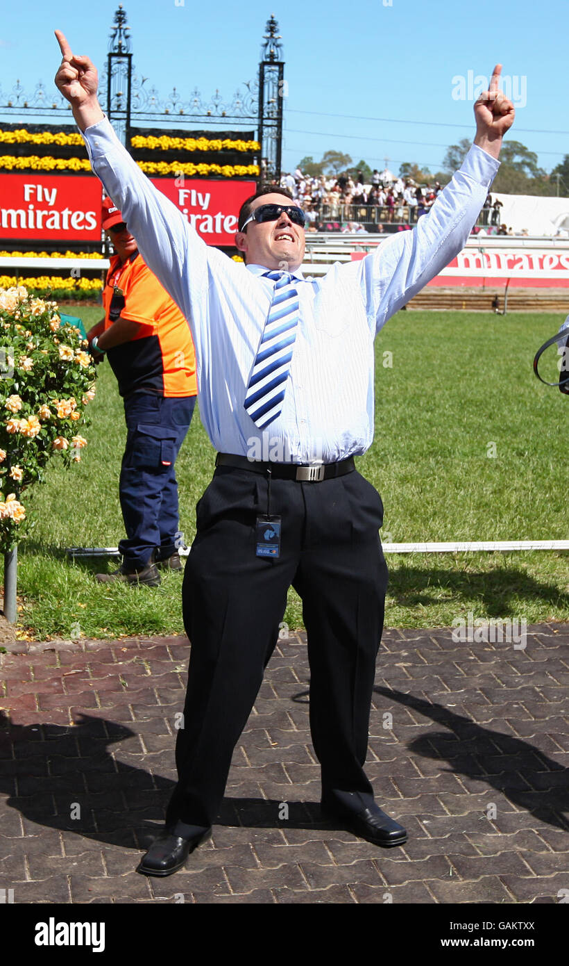 Mark Dosen, stable manager of Efficient celebrates after his horse ...