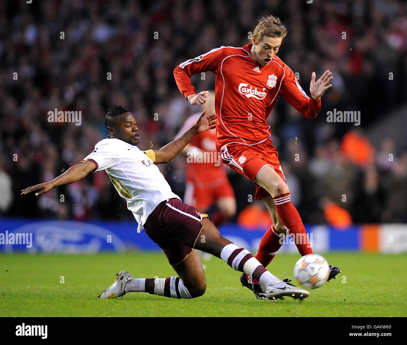 Liverpool's Peter Crouch (r) and Arsenal's William Gallas (l) battle ...