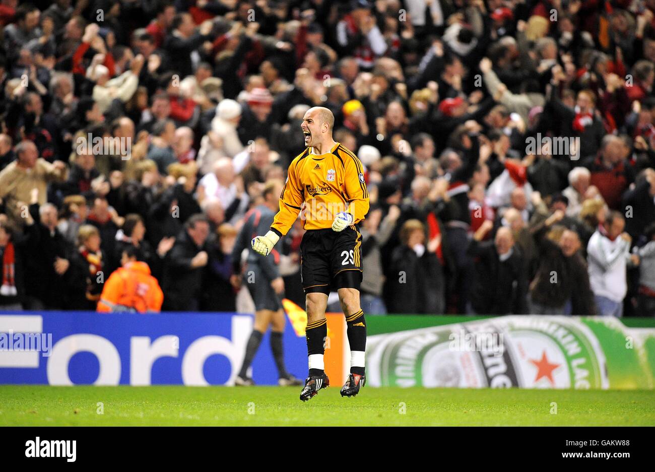 Liverpool goalkeeper Jose Reina celebrates the third goal of the match ...