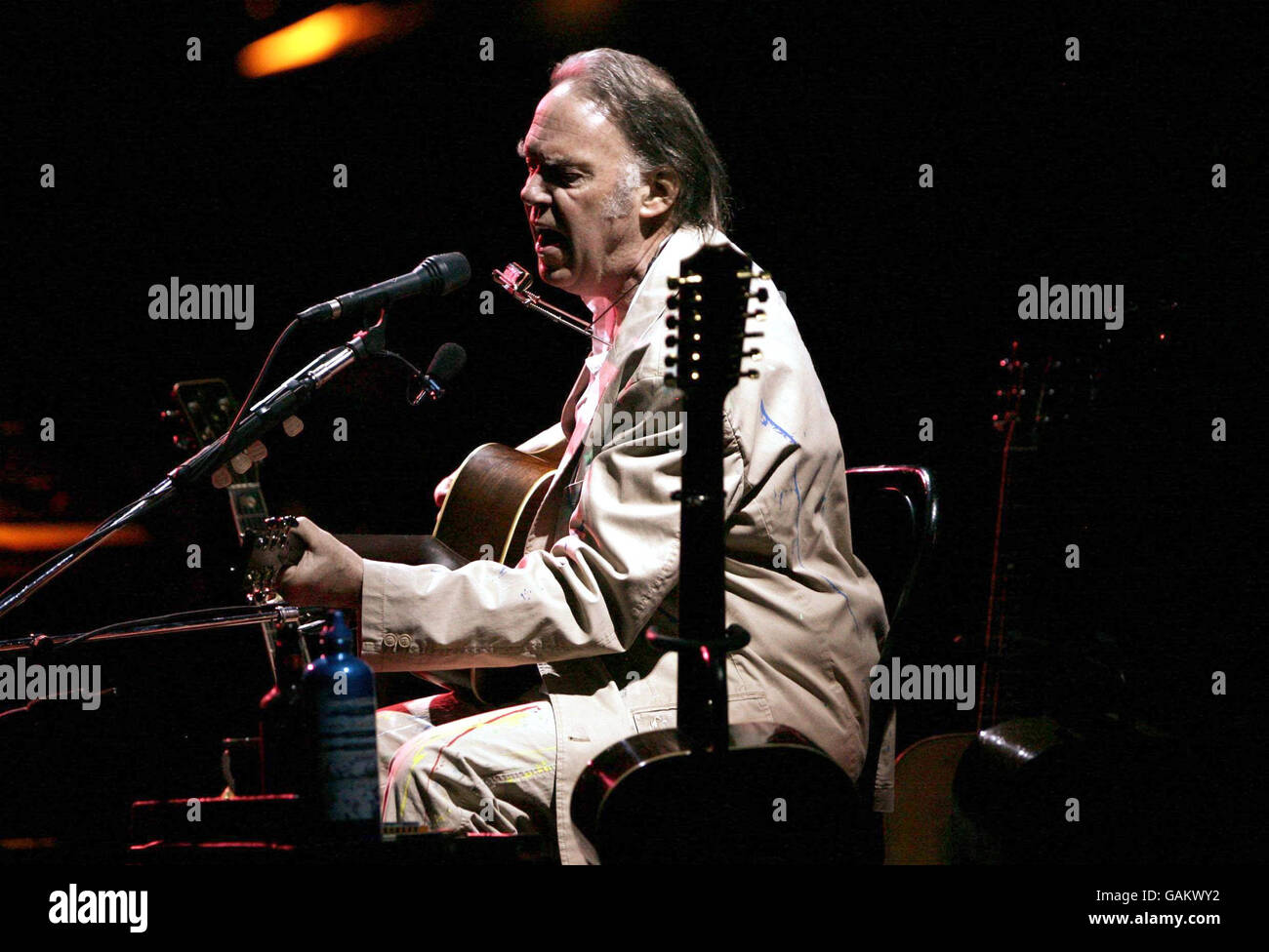 Neil Young performing the acoustic half of his concert at the ...