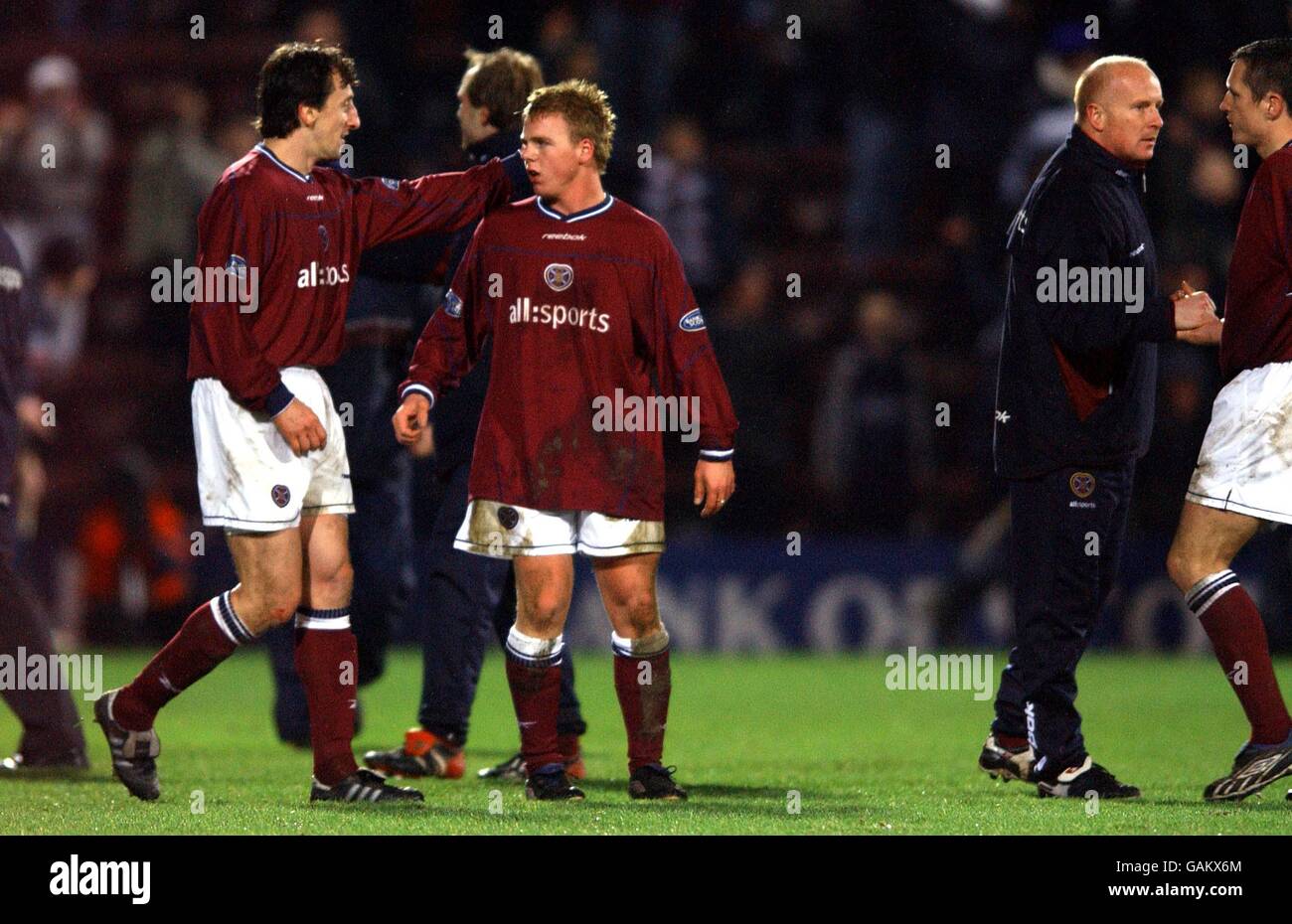 Heart of Midlothian's substitute Graham Weir (c) is congratulated after ...