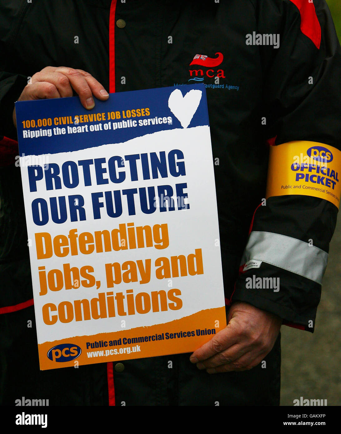 Coastguards outside the entrance to the Coast Guard Station at Langdon ...