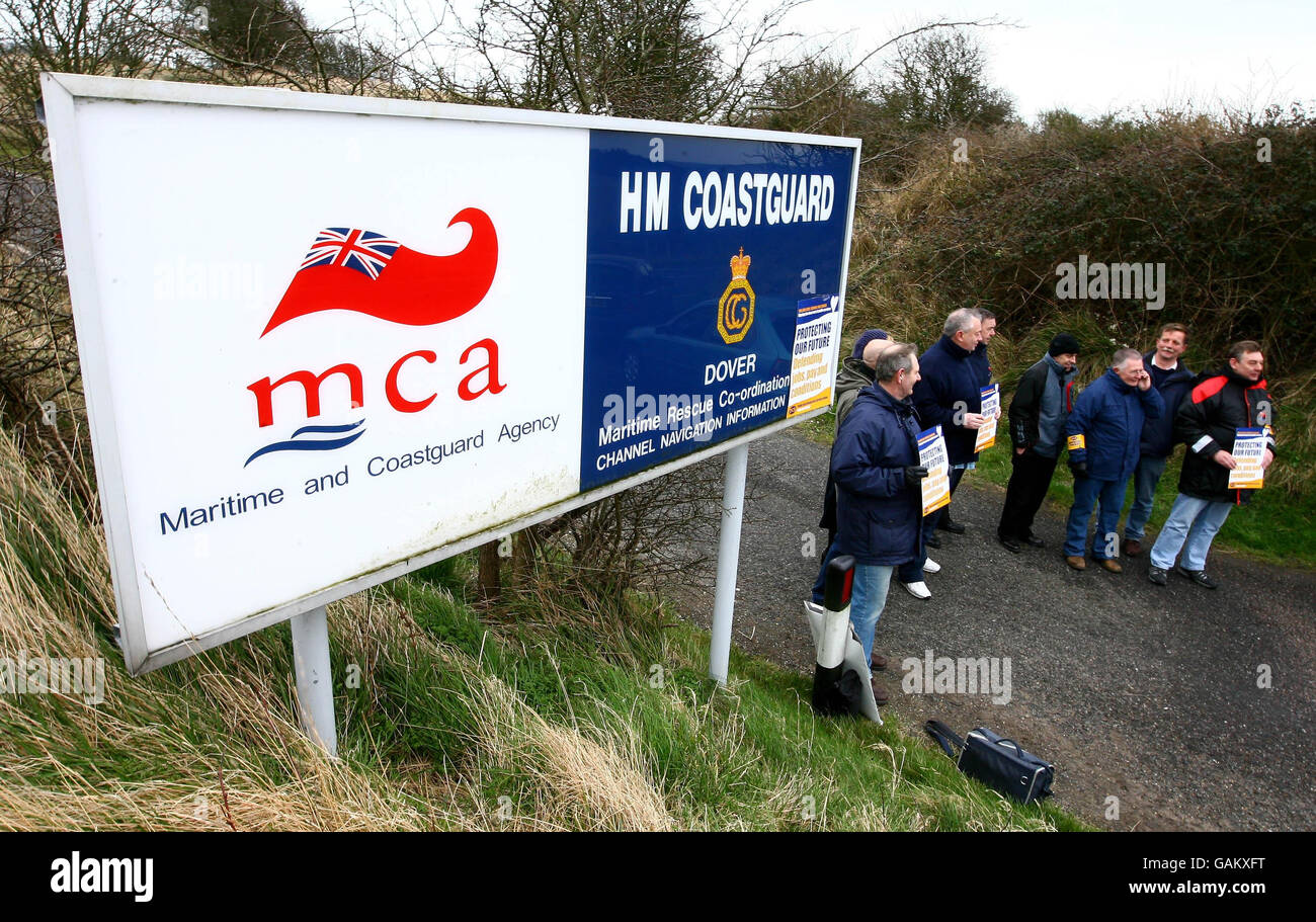 Coastguards outside the entrance to the Coast Guard Station at Langdon ...