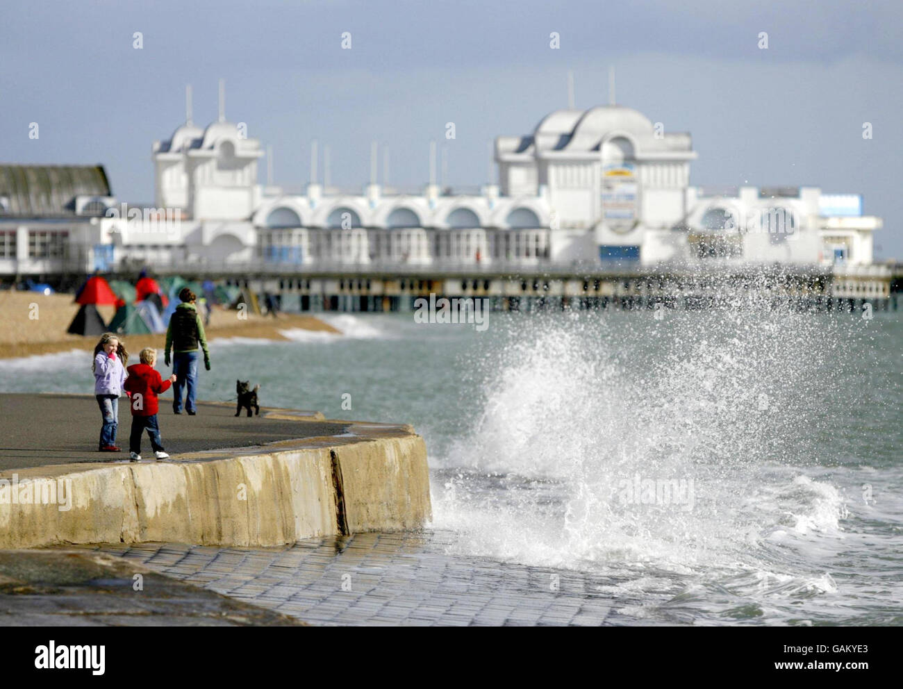 Walkers make calm conditions on seafront southsea hi-res stock ...