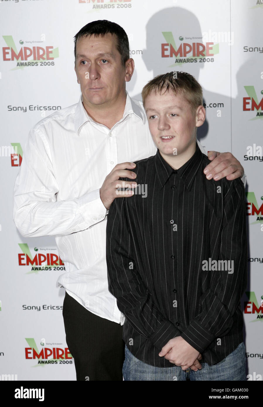 Thomas Turgoose (right) arriving for the 2008 Empire Film Awards at the ...