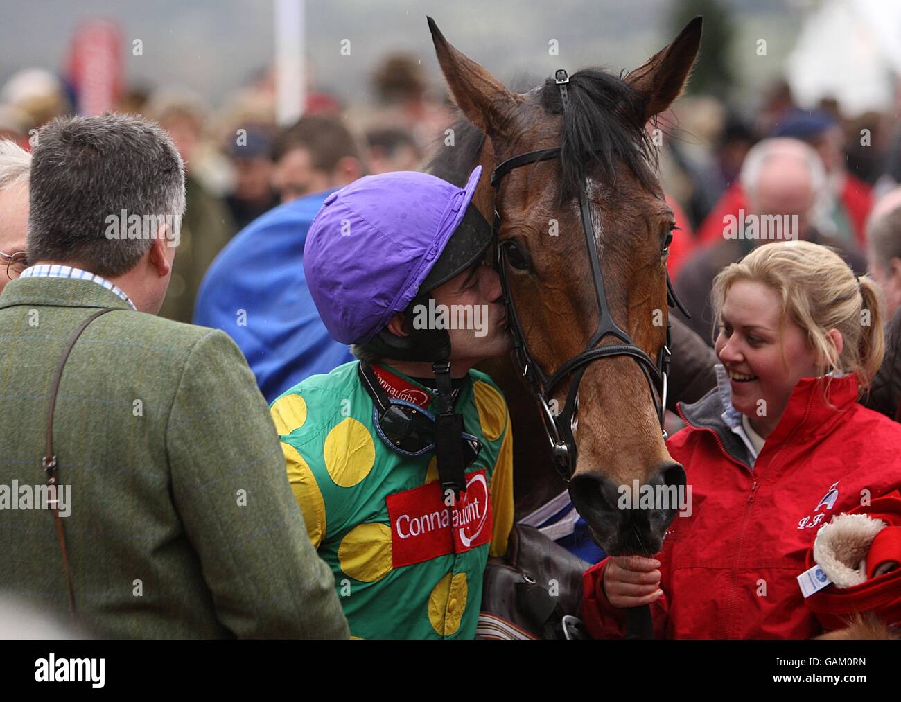 Jockey Ruby Walsh (c) celebrates by kissing Master Minded after winning ...