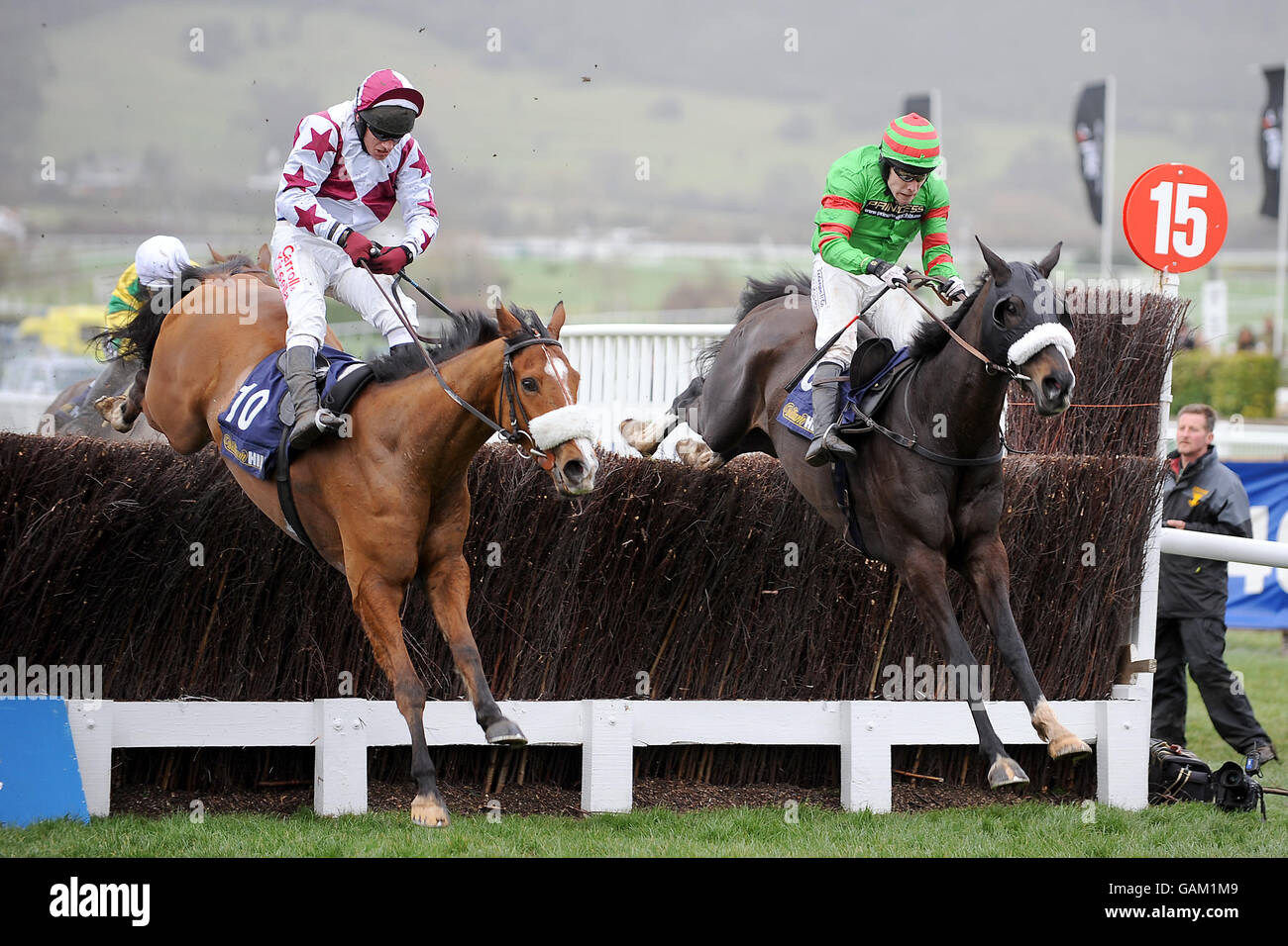 Jockey Tom Scudamore on An Accordion (r) and Jockey Paul Carberry on ...