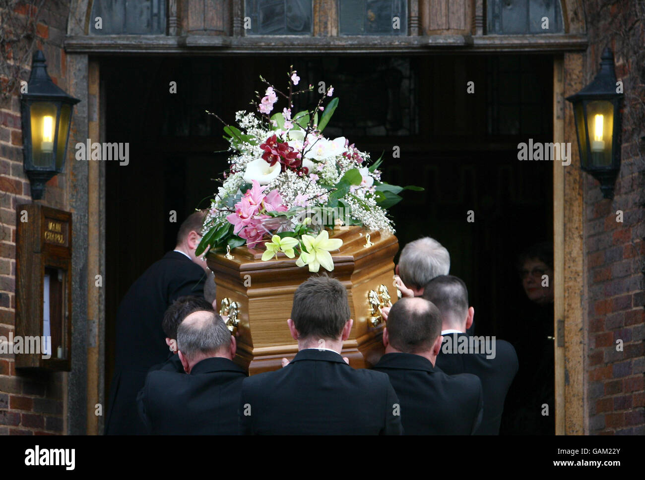 The coffin of former ITN newsreader Carol Barnes is taken into the ...