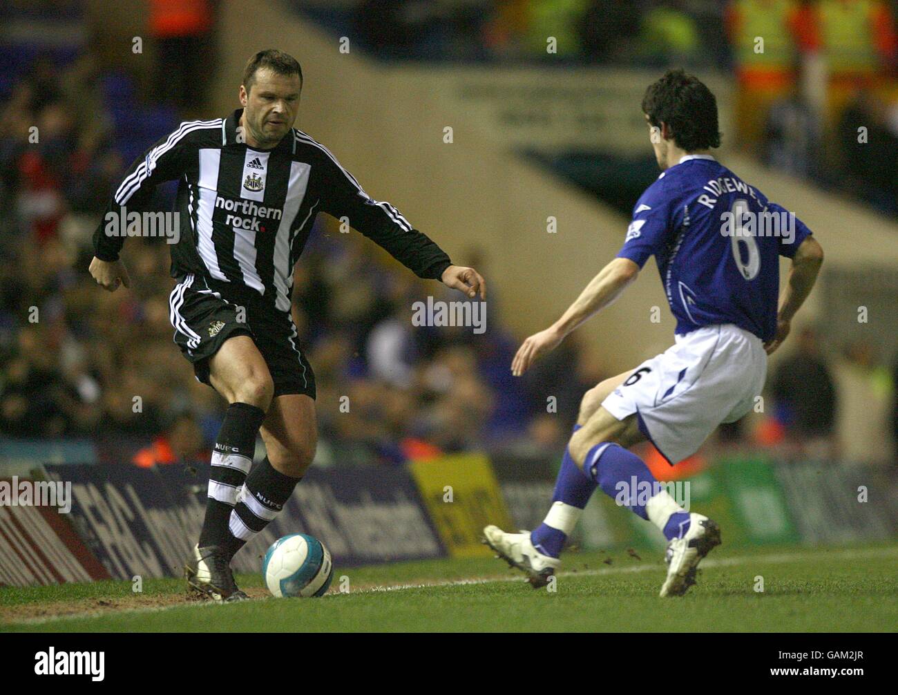 Newcastle United's Mark Viduka (left) tries to get past Birmingham City ...