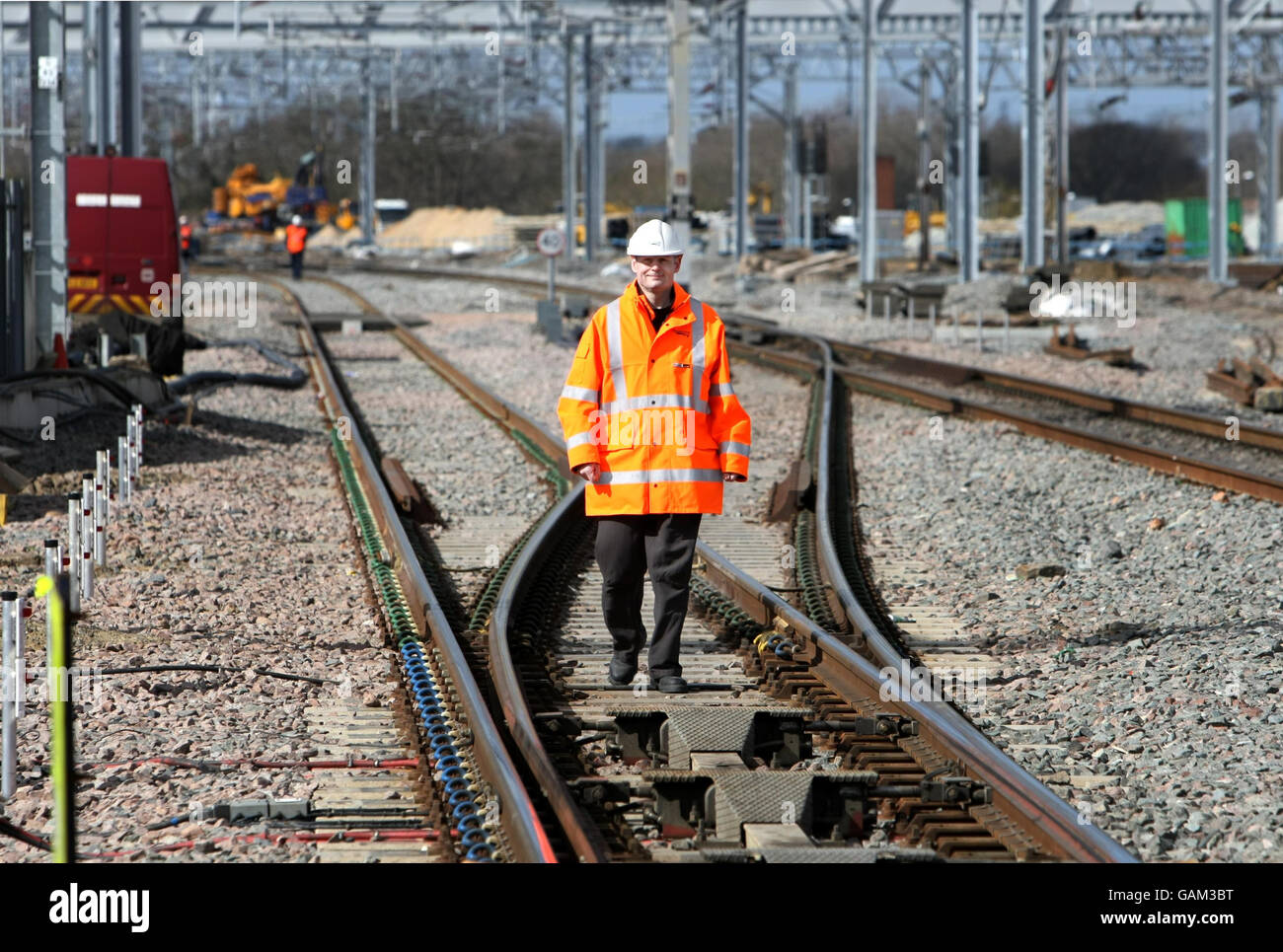 Network Rail CEO Iain Coucher walks along the tracks at Rugby station ...