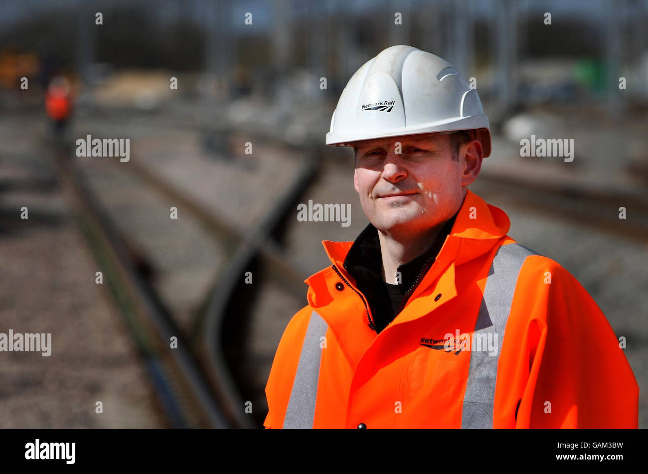 Network Rail CEO Iain Coucher walks along the tracks at Rugby station ...